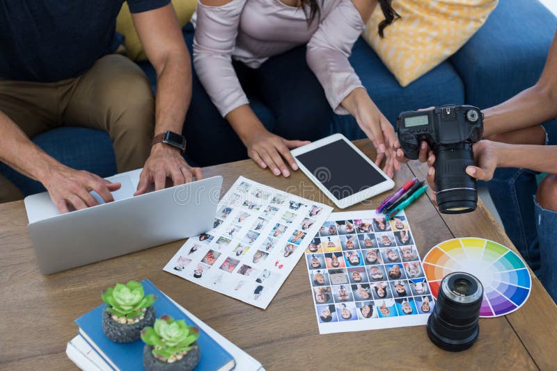 Graphic Designers Working Together in the Office Stock Image - Image of ...