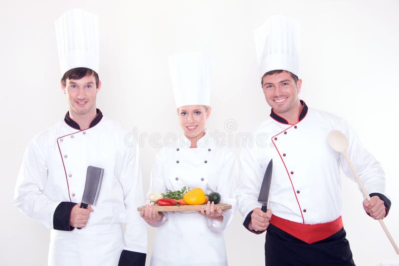 Happy Chefs with Variety of Sweet Dishes Stock Image - Image of ...