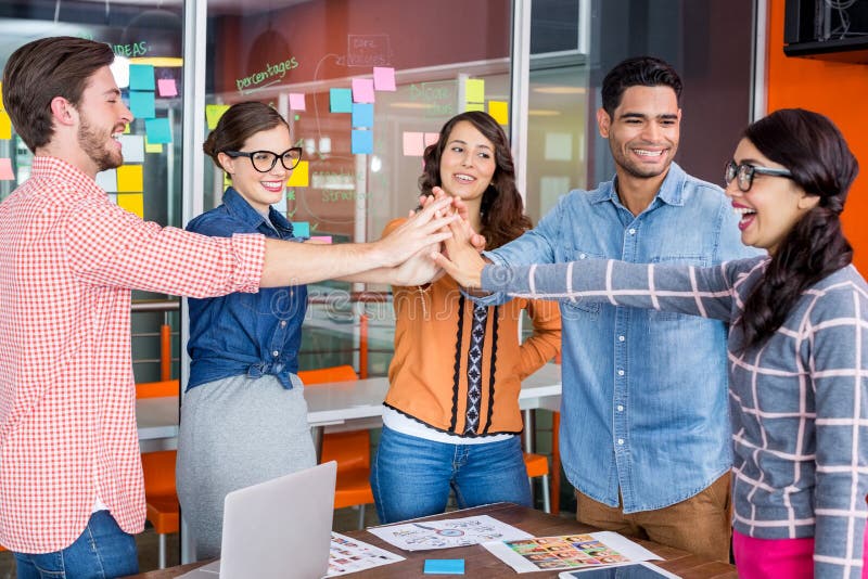 Team of Happy Graphic Designers Giving High Five Stock Image - Image of ...