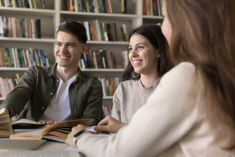 Team of Happy Students Discussing Class Project in Library Stock Image ...