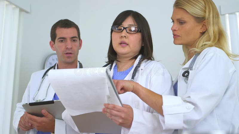 Team of Highly Skilled Doctors Reviewing Patient S Health Problems ...