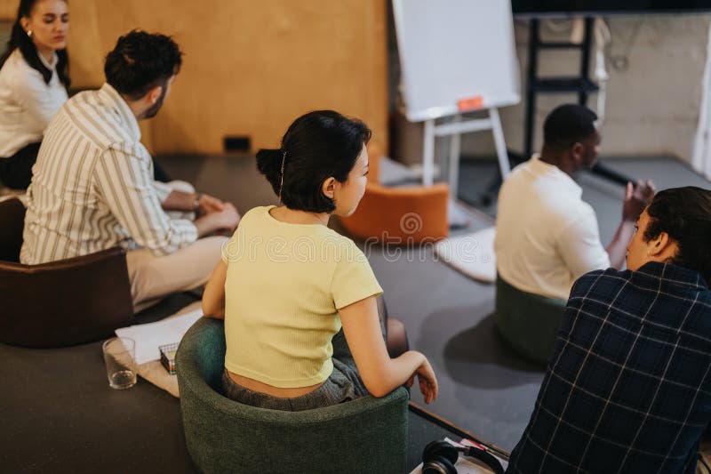 Group of Professionals Collaborating in a Modern Office Space Stock ...