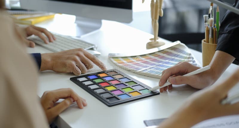 Team of Interior Designers Working Together on a Creative Project ...