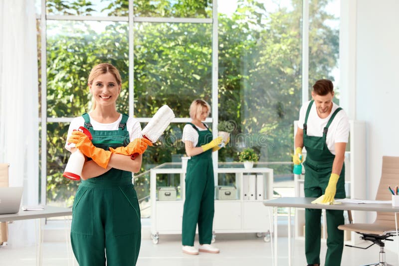Team of Janitors in Uniform Stock Photo - Image of business, chores ...