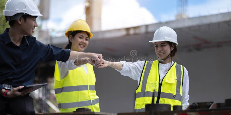 Team Job of Teamwork Engineer Work Together in a Construction Site with ...