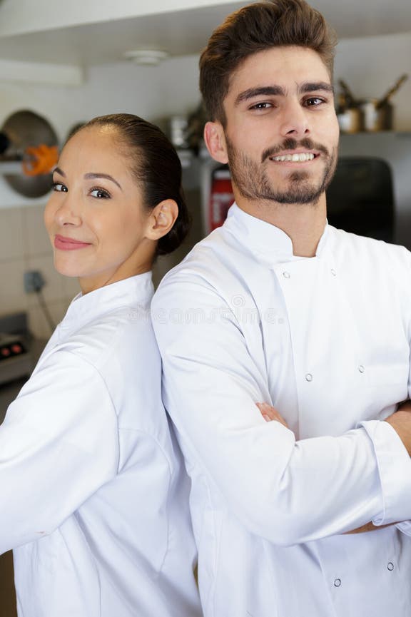 Team Kitchen Workers Posing Stock Image - Image of team, kitchen: 318448355