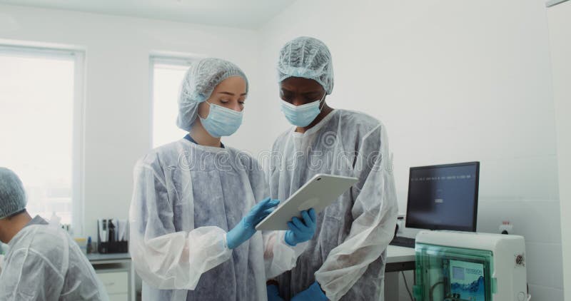 A Team of Laboratory Technicians Work in a Modern, Well-equipped ...