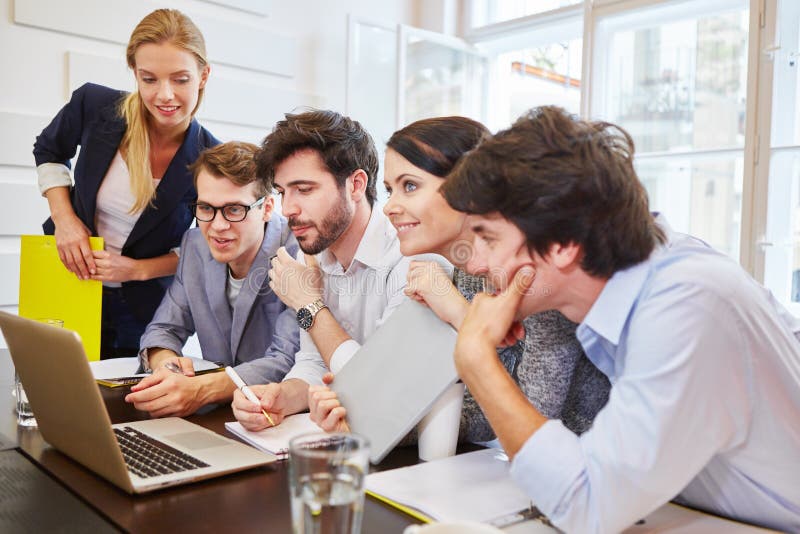 Team with Laptop at Workshop Stock Image - Image of partner, laptop ...