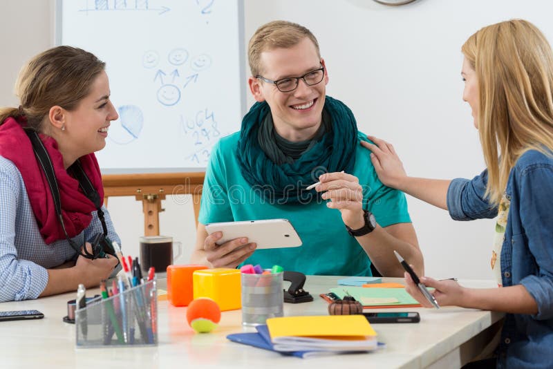 Team laughing at work stock photo. Image of employees - 52136452