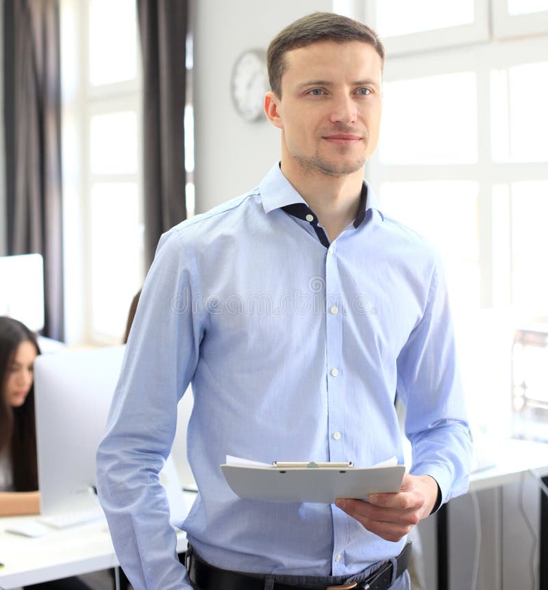 Team Leader with Coworkers Working in Office. Stock Image - Image of ...