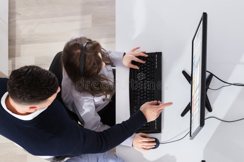 Team Leader Giving Training To His Call Center Operator Stock Photo ...