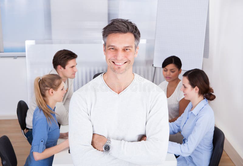 Team Leader Standing at Workplace Stock Photo - Image of cheerful ...