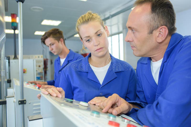 Team and Machine Operation Study Stock Photo - Image of examination ...