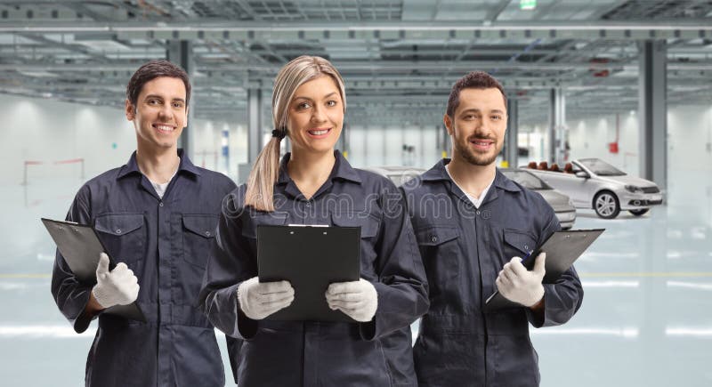 Team of Mechanics Holding Working Tools Stock Photo - Image of wrench ...