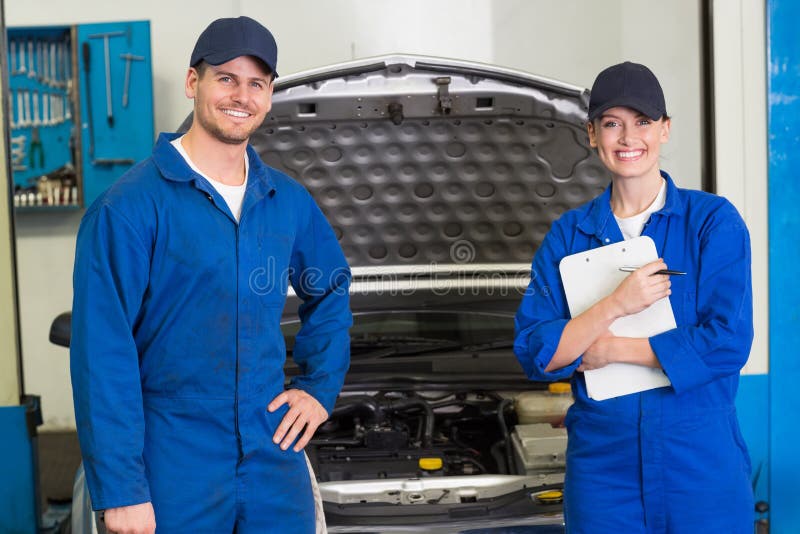 Team of Mechanics Smiling at Camera Stock Image - Image of maintenance ...