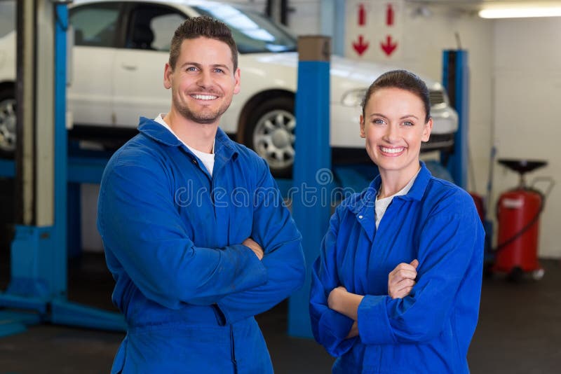 Team of Mechanics Working Together Stock Image - Image of repairing ...