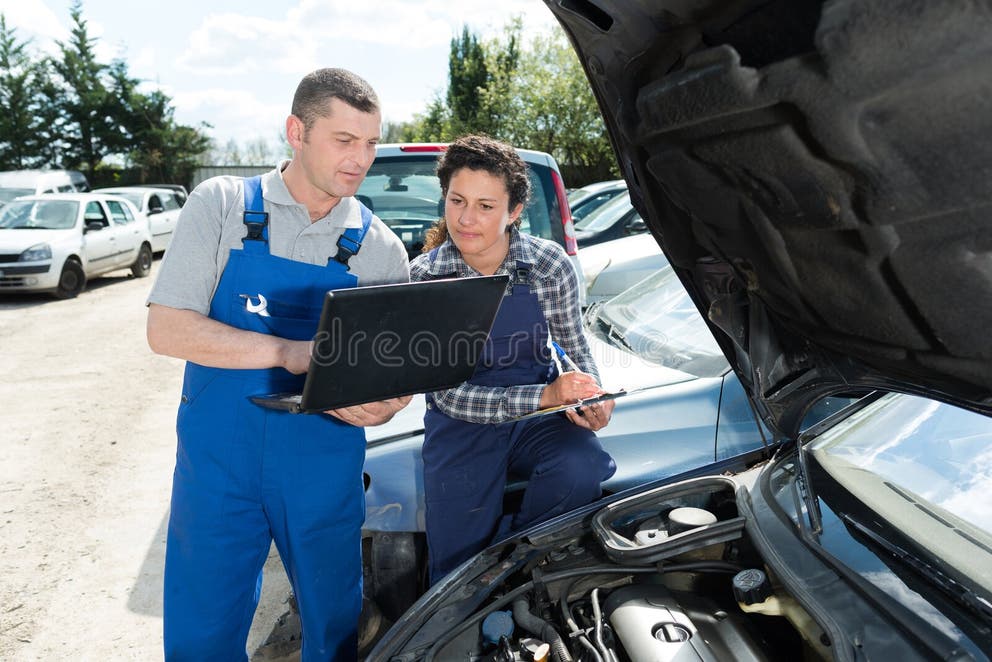 Team Mechanics Working at Garage Stock Image - Image of customerservice ...