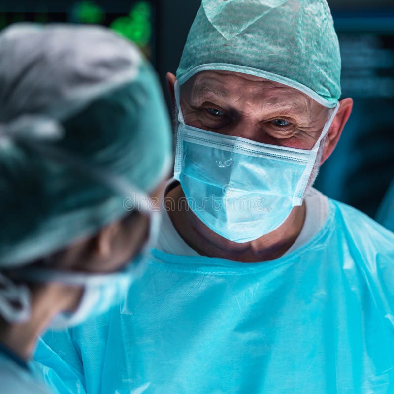 Team of Medical Doctors Performs Surgical Operation in Modern Operating ...