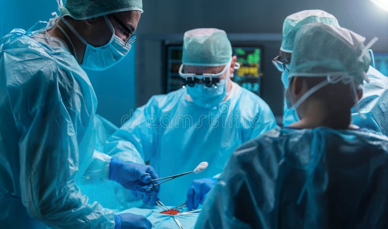 Team of Medical Doctors Performs Surgical Operation in Modern Operating ...