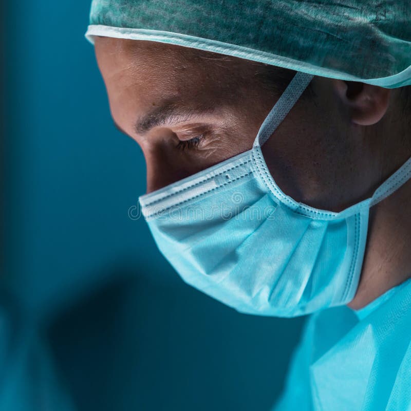 Team of Medical Doctors Performs Surgical Operation in Modern Operating ...