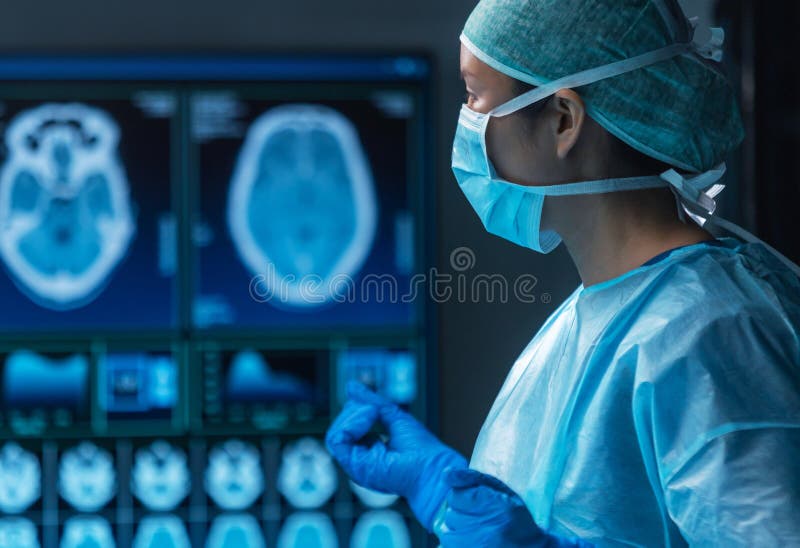 Team of Medical Doctors Performs Surgical Operation in Modern Operating ...