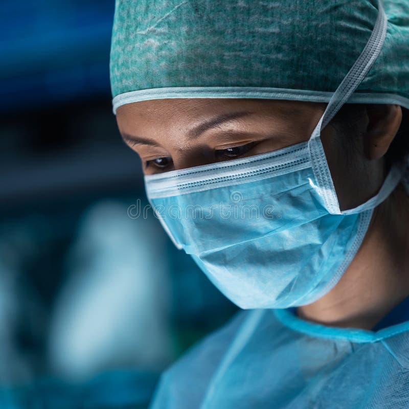 Team of Medical Doctors Performs Surgical Operation in Modern Operating ...