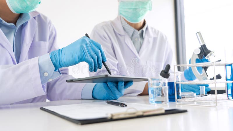 Team of Medical Research Scientists or Researcher in Lab Coat Testing ...