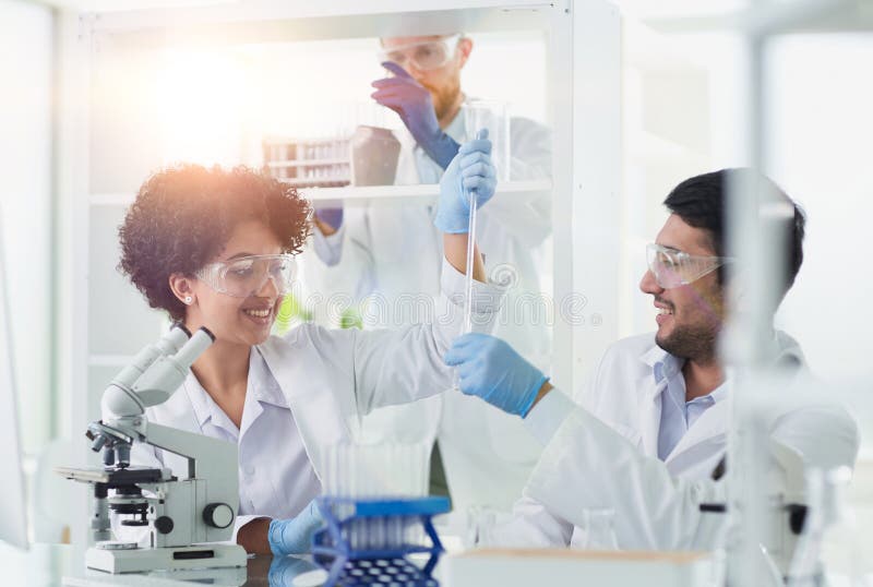 Team of Medical Research Scientists Working on Generation Experimental ...