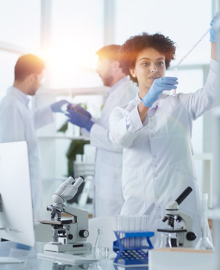 Team of Medical Research Scientists Working on Generation Experimental ...