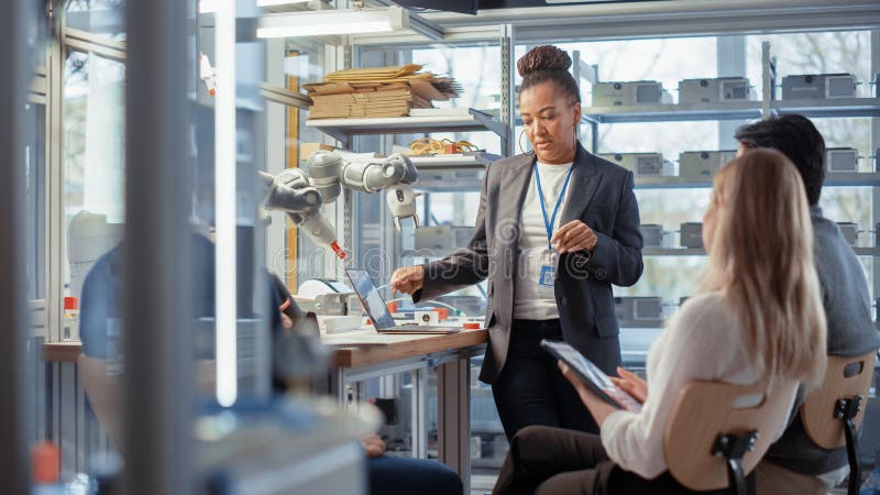 Team Meeting of Engineers Working on an Innovative More Efficient Ways ...