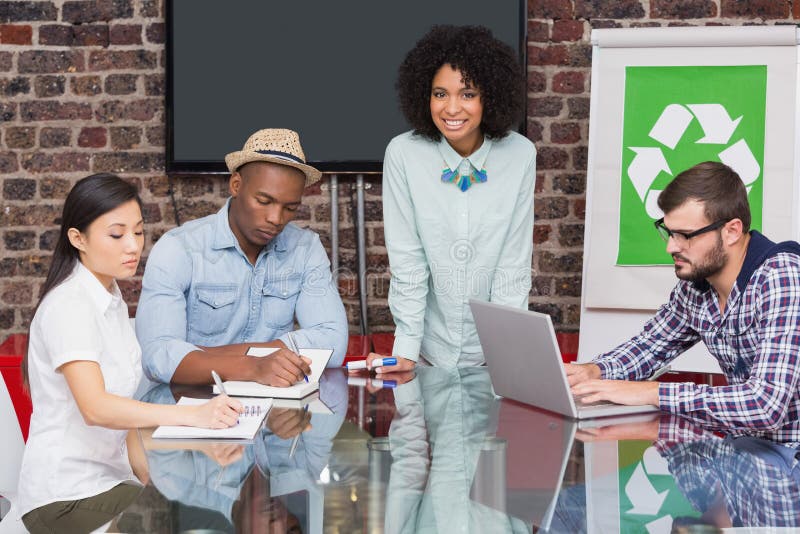 Team in Meeting with Recycling Symbol on Whiteboard Stock Image - Image ...