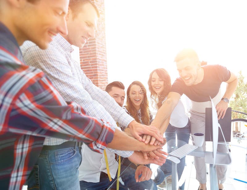 Team Meeting are Stacked Hands in Creative Office. Stock Image - Image ...