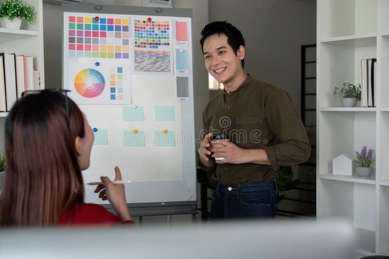 Team Collaboration and Creativity. a Graphic Design Team Brainstorming ...