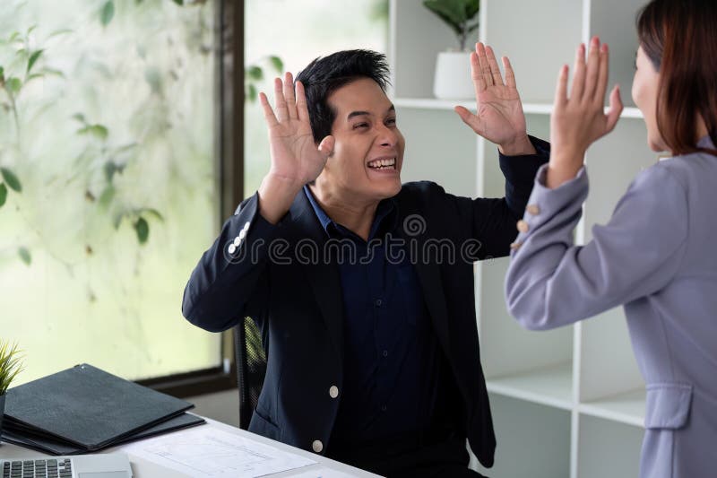 Celebration of Success and Team Spirit. Colleagues Sharing a Joyful ...