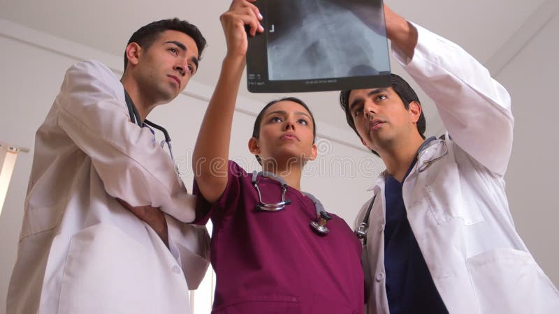 Team of Mexican Doctors Analyzing X-ray Stock Video - Video of doctor ...
