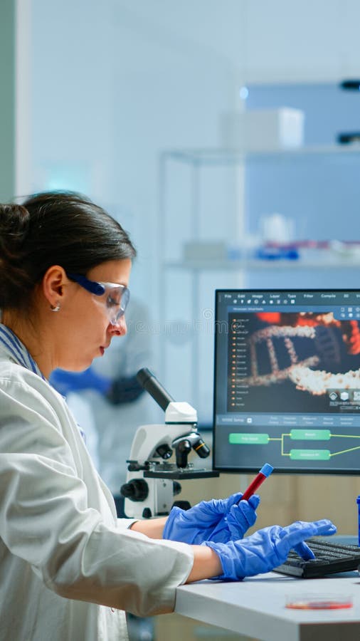 Team of Microbiology Scientists Discussing about Virus Development ...