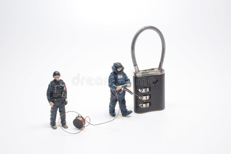 A Team of Mini Figure Broke the Lock Stock Photo - Image of burglar ...