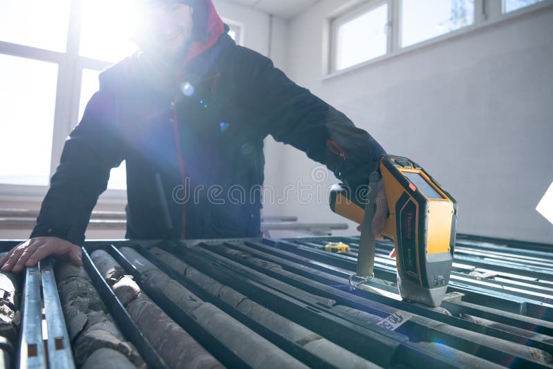 Team of Mining Workers Measuring Drilled Rock Core Stock Image - Image ...