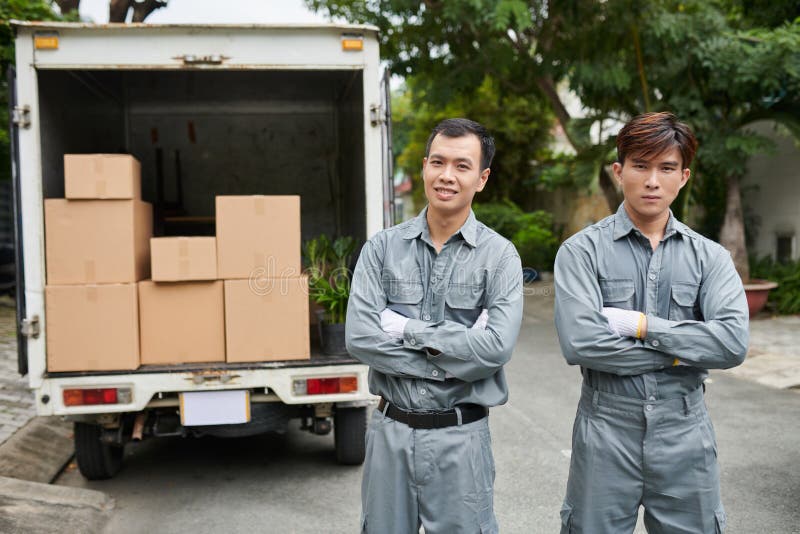 Team of Movers in Front of Truck Stock Image - Image of shipping ...