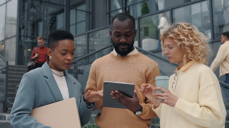Multicultural Business Colleagues Talking on Street Stock Footage ...