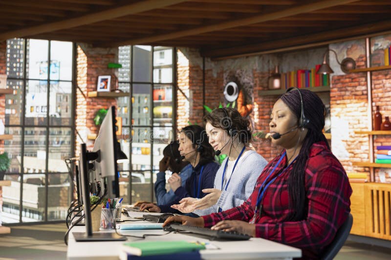 Team of Multiethnic Call Center Workers Typing on PC Keyboard ...