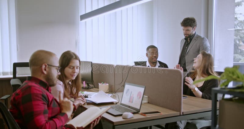 Group of Business Professionals Working Together in a Modern Open ...