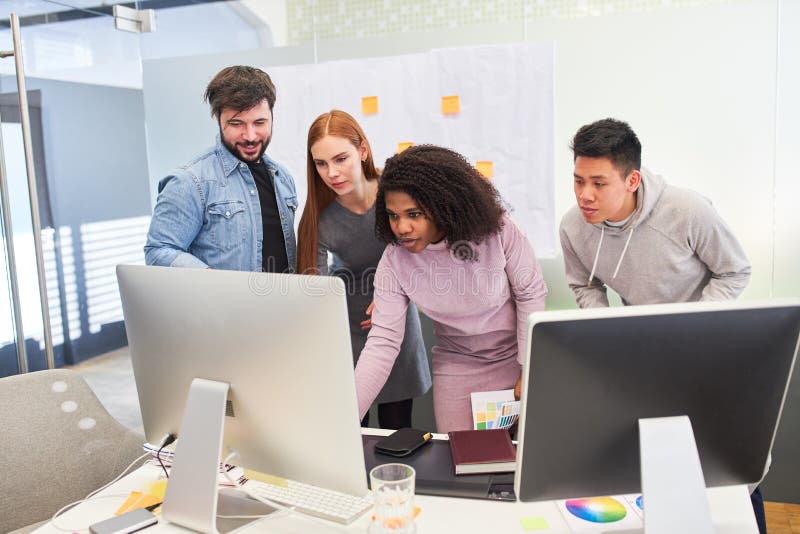 Team on the PC in the Creative Web Development Stock Photo - Image of ...