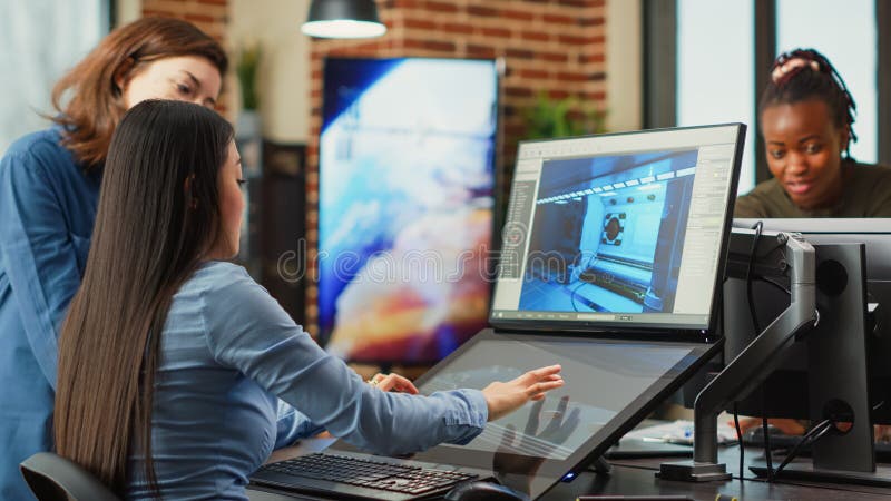 Team of People Working with Touchscreen Display for Gaming App Stock ...