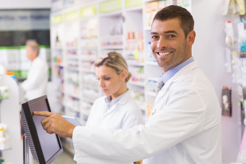 Team of Pharmacists Using Computer Stock Image - Image of electronic ...