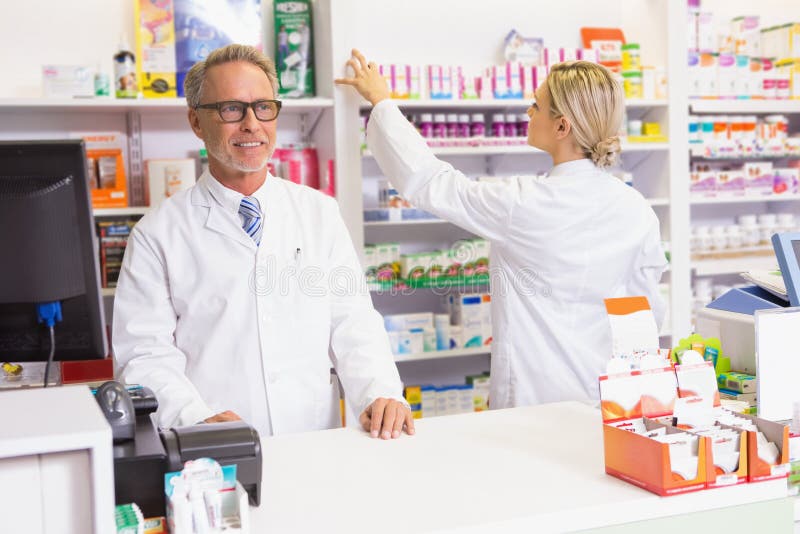 Team of Pharmacists Working Together Stock Photo - Image of adult ...