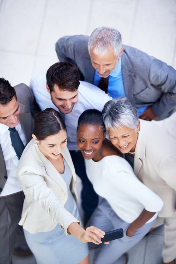 Team Pose. a Diverse Group of Businesspeople Taking a Team Photo of ...