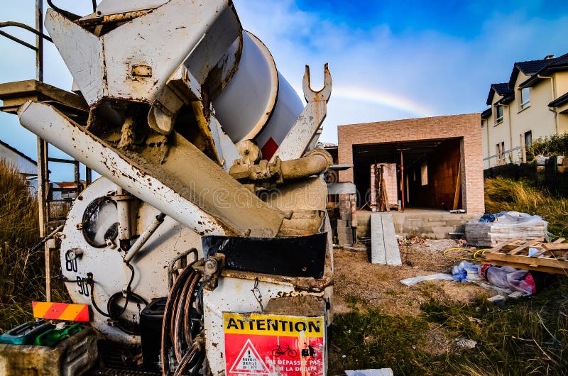 Team Pouring a Concrete Screed on a Construction Site of a Detached ...