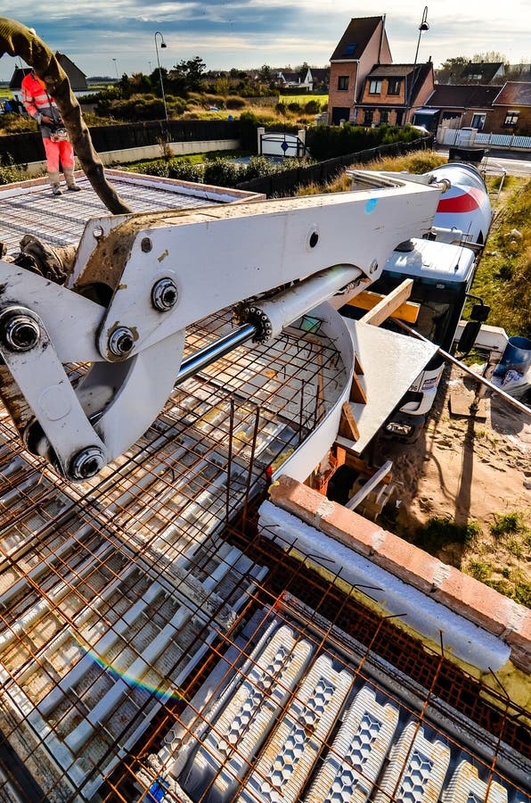 Team Pouring a Concrete Screed on a Construction Site of a Detached ...