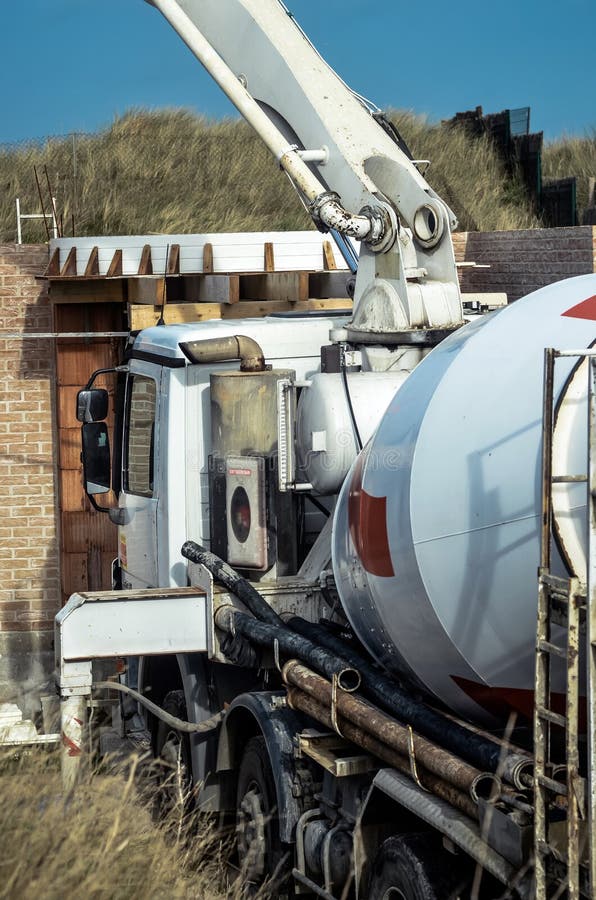 Team Pouring a Concrete Screed on a Construction Site of a Detached ...